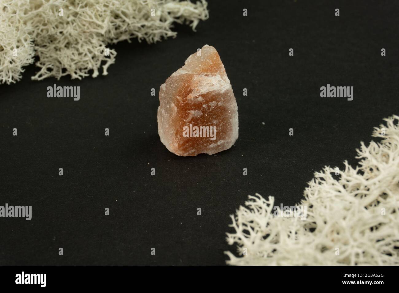 Halite or rock salt from Pakistan. Natural mineral stone on a black ...