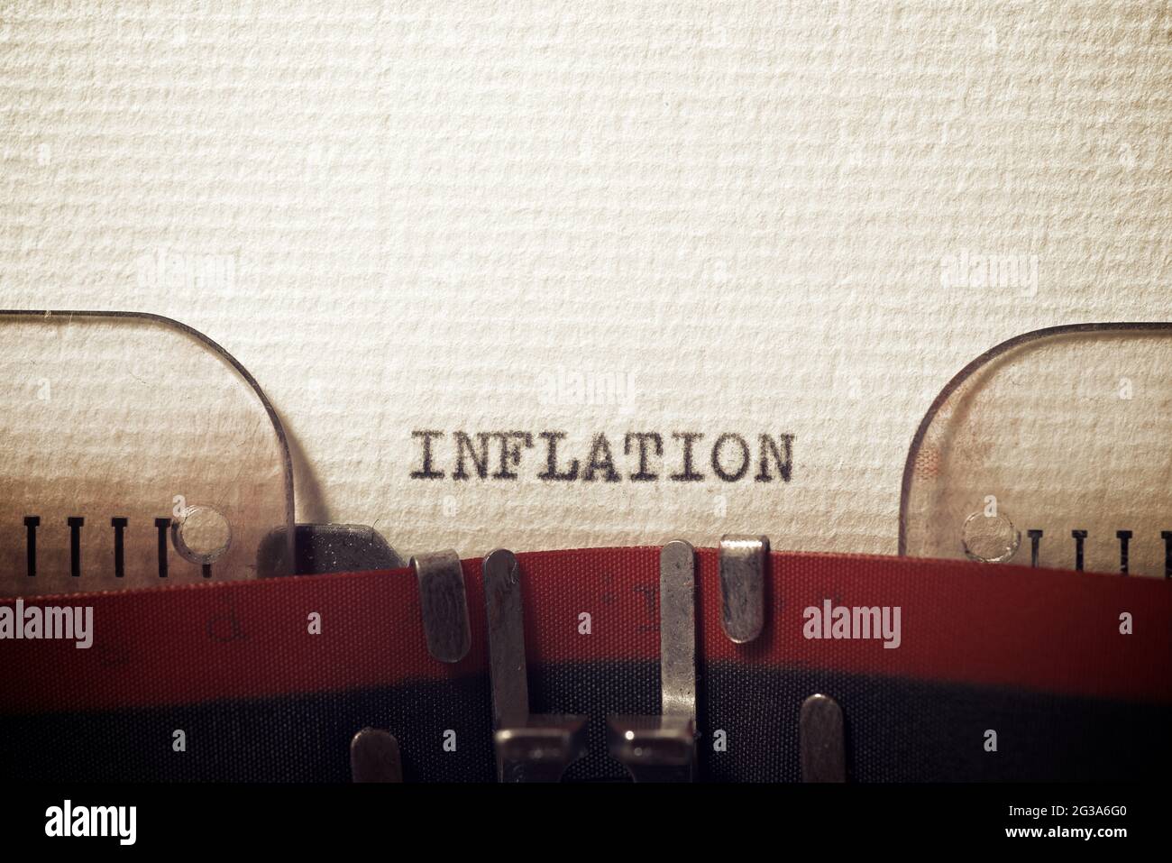 The word inflation written with a typewriter Stock Photo - Alamy