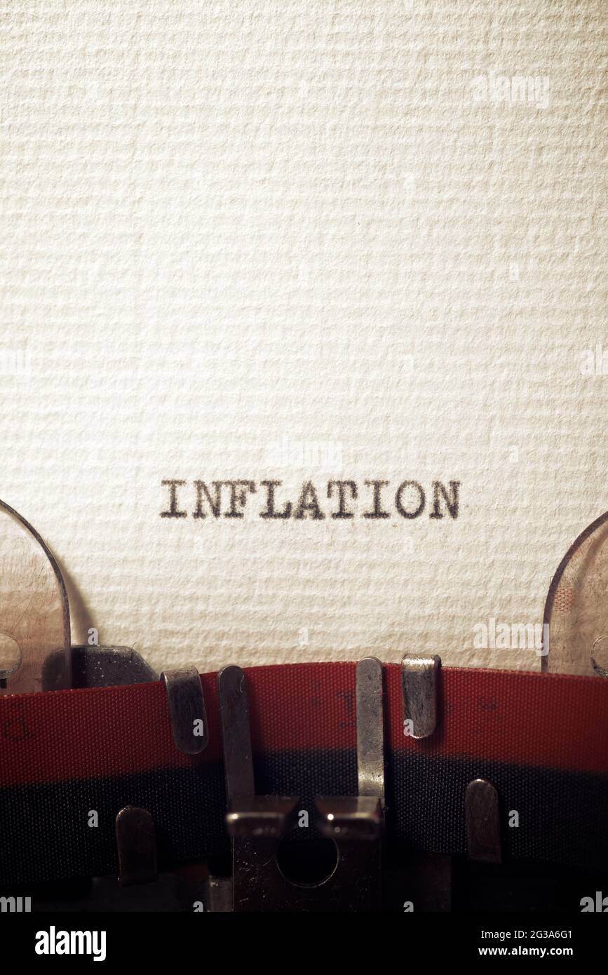 The word inflation written with a typewriter Stock Photo - Alamy