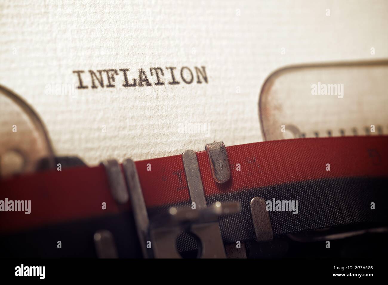 The word inflation written with a typewriter Stock Photo - Alamy