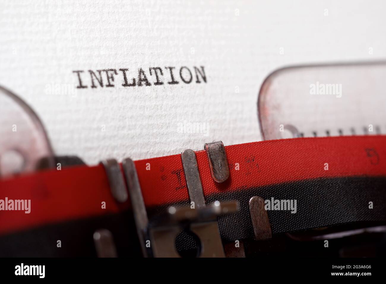 The word inflation written with a typewriter Stock Photo - Alamy