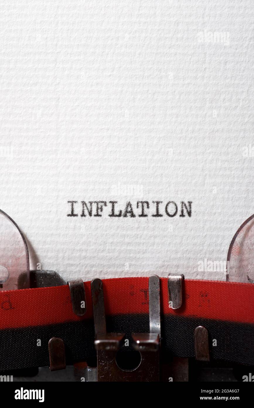 The word inflation written with a typewriter Stock Photo - Alamy