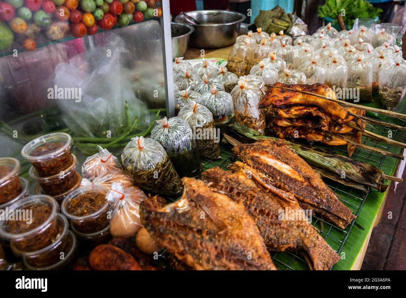 A plethora of prepared Thai street foods await customers at this robust ...