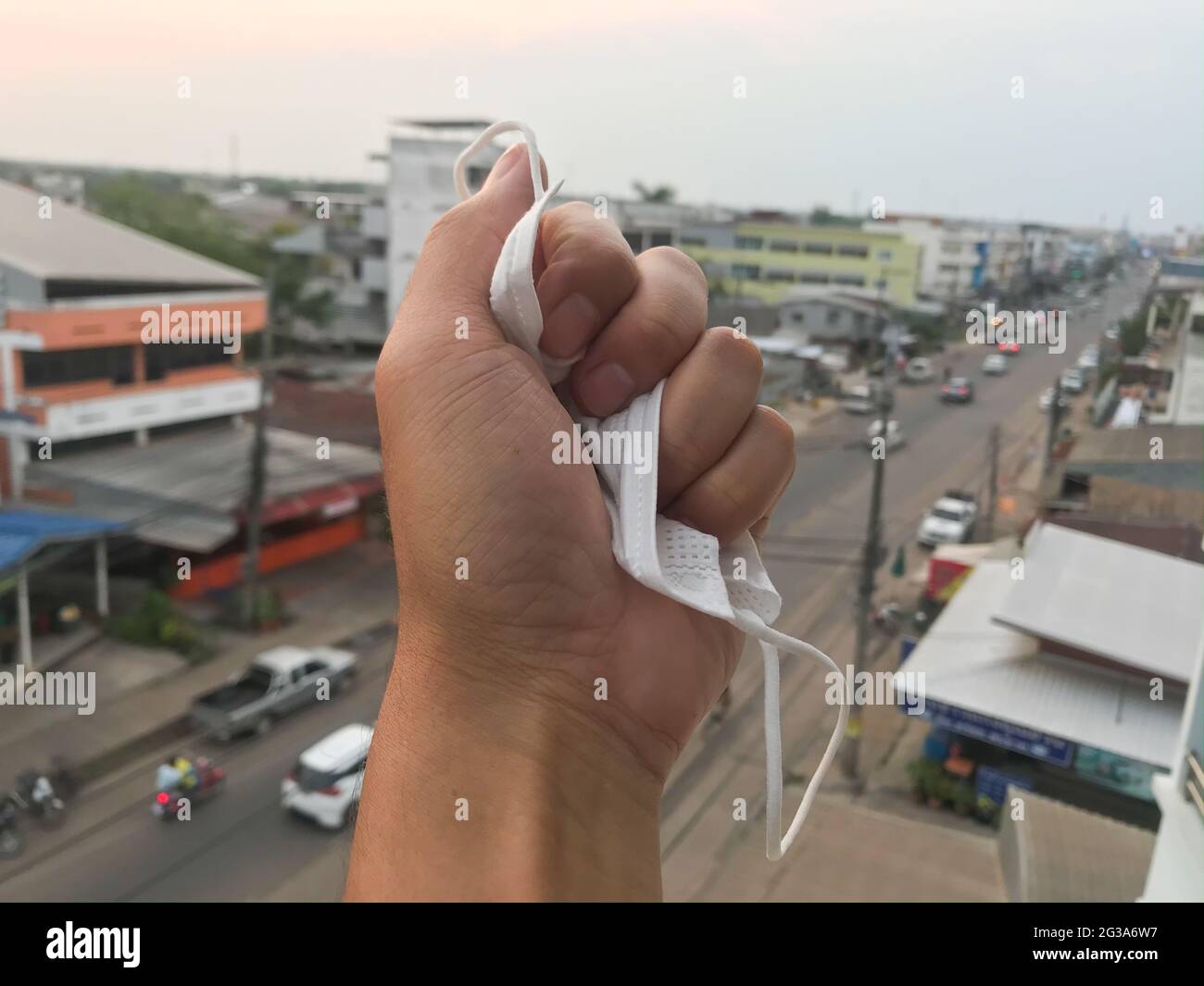 Hand holding disposable sanitation mask.Protect yourself from viruses ...