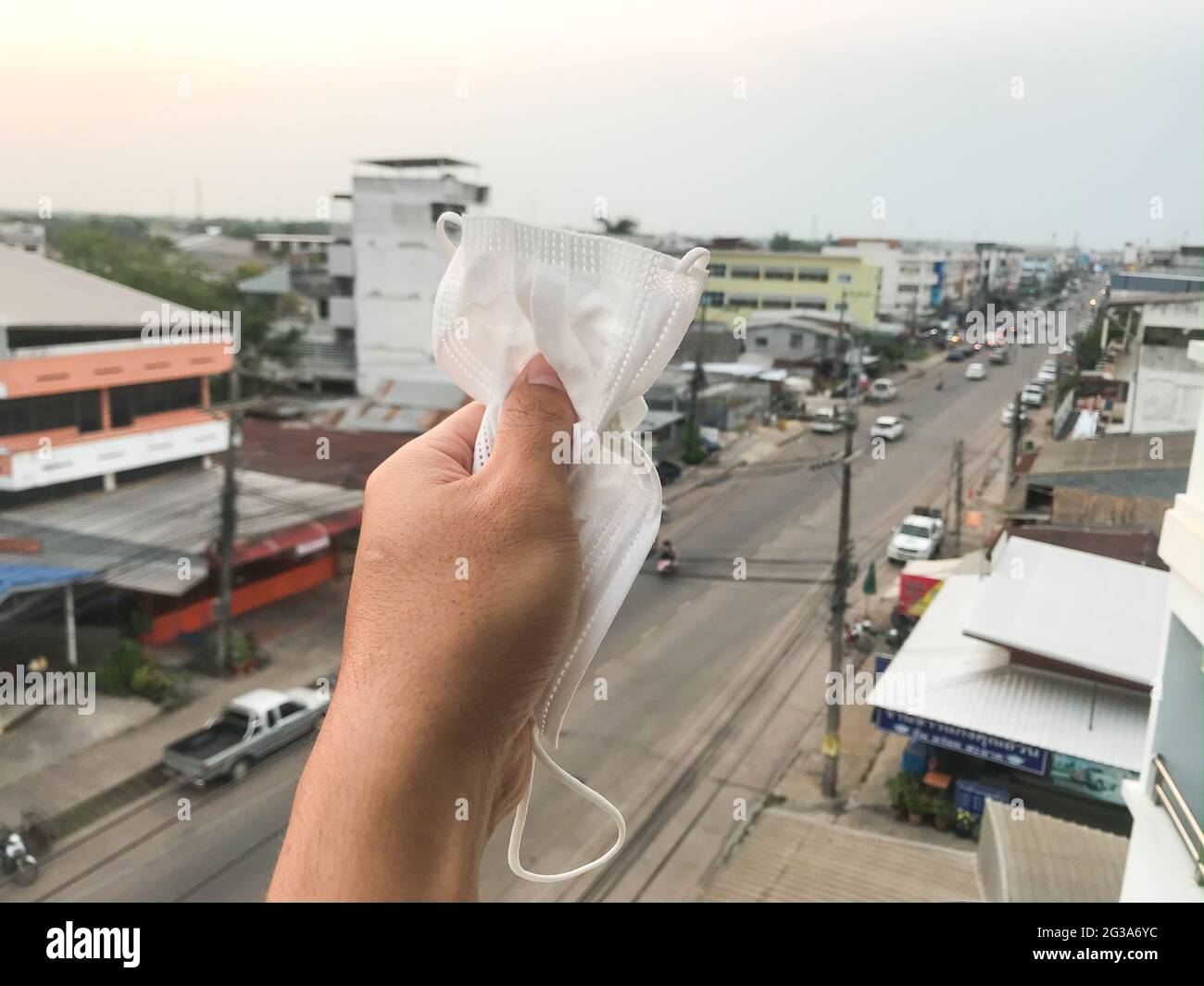 Hand holding disposable sanitation mask.Protect yourself from viruses ...