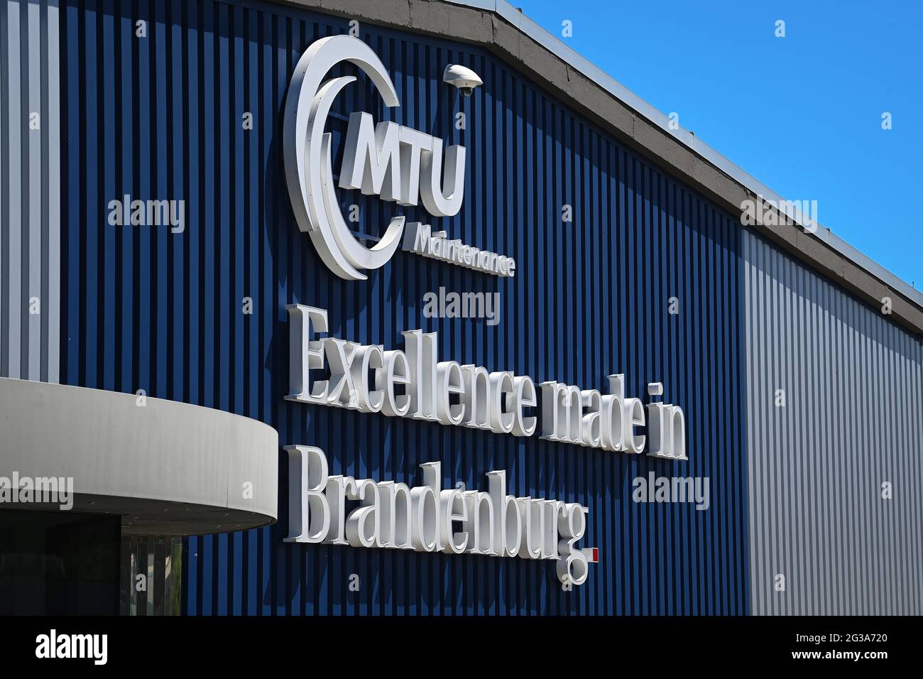 Ludwigsfelde, Germany. 14th June, 2021. The lettering "Excellence made ...