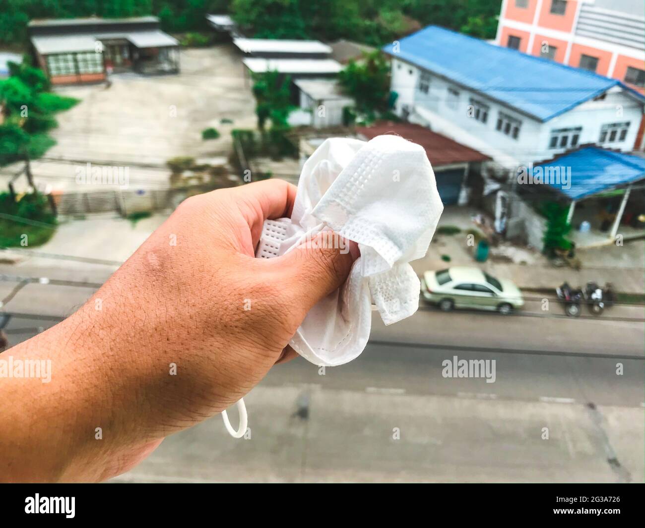 Hand holding disposable sanitation mask.Protect yourself from viruses ...