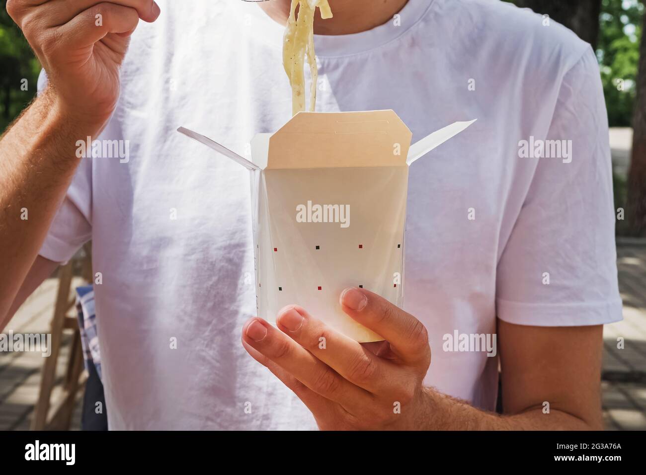Close up man eating pasta hi-res stock photography and images - Alamy