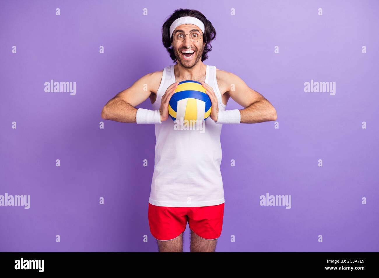 Photo of crazy man hold ball open mouth look camera wear specs singlet ...