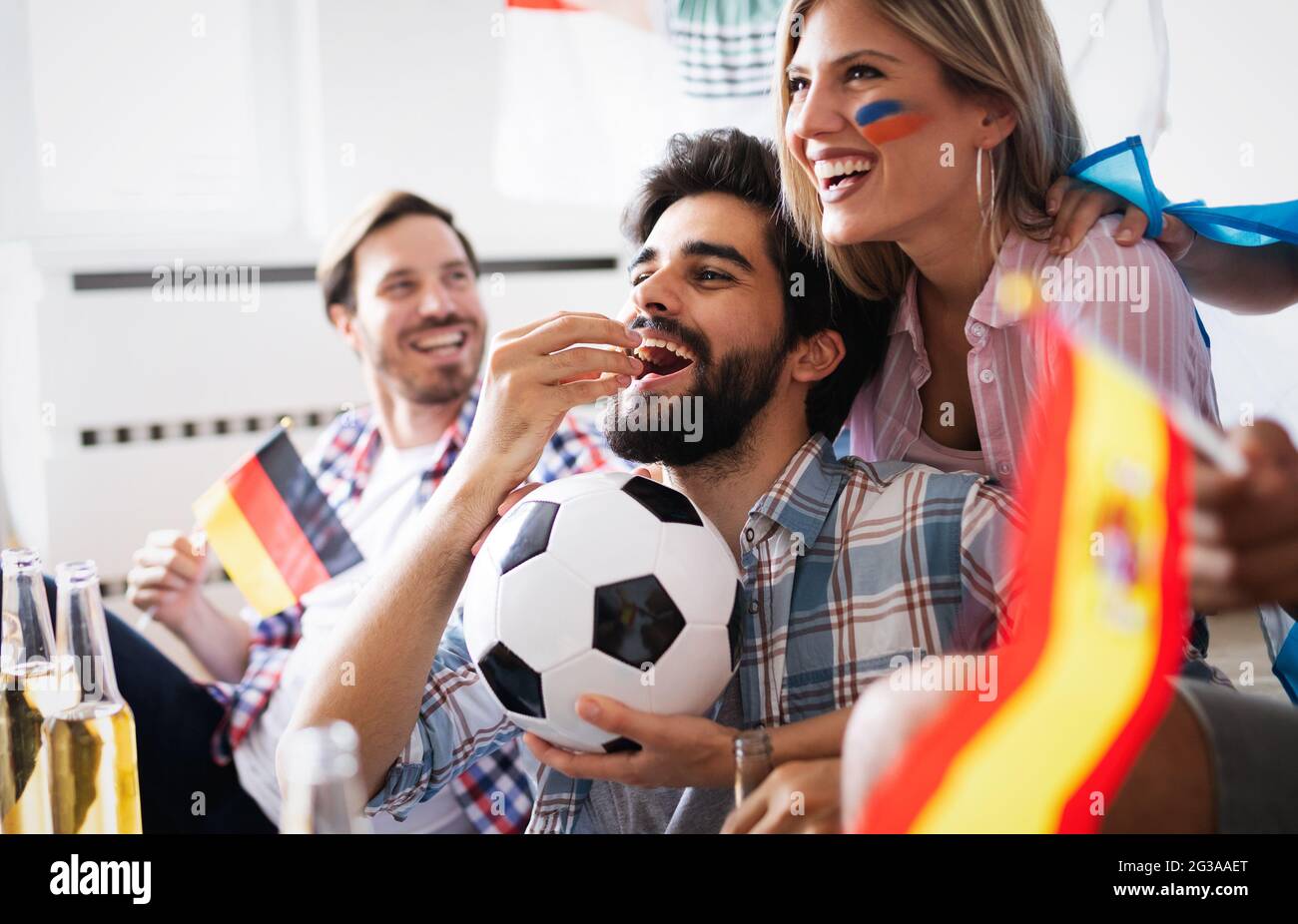 Couple watching the olympic games hi-res stock photography and images ...