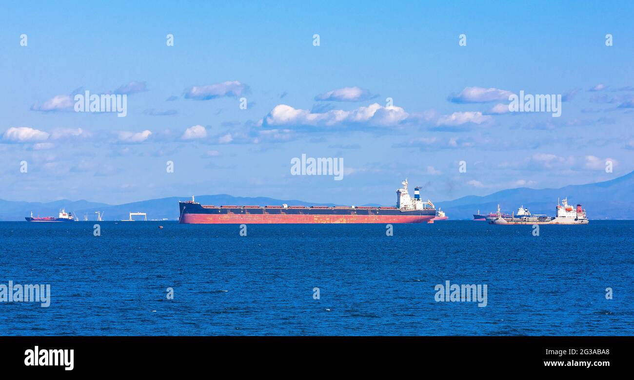 Empty container freighter ship waiting on Vladivostok, Russia Stock ...