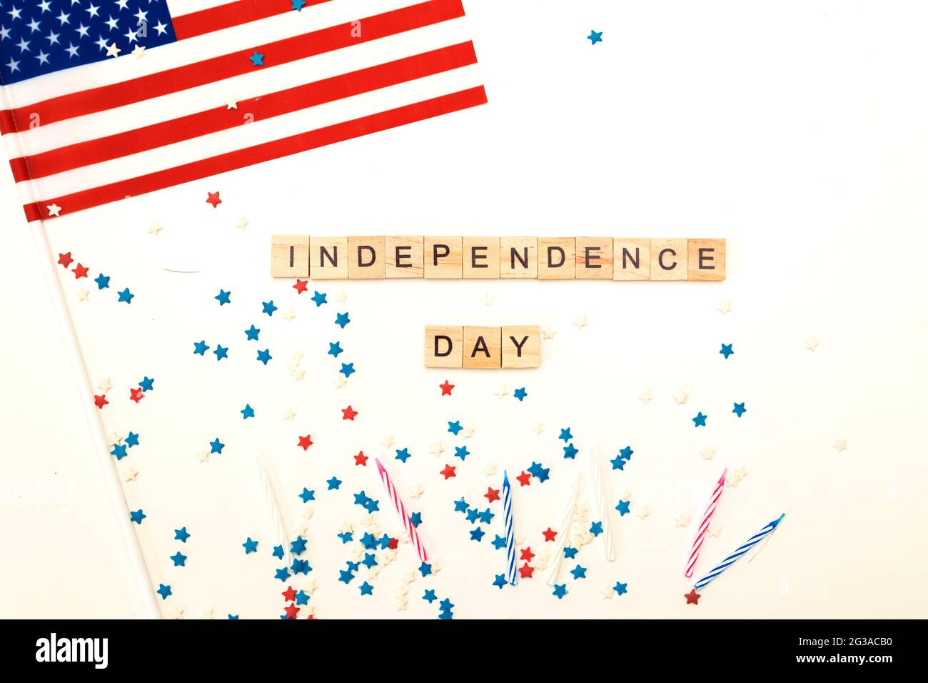 The inscription Independence Day in wooden letters on a white ...