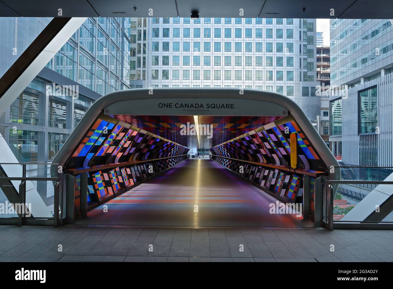 London (UK), 10 May 2021: Adams Plaza Bridge in Docklands connecting ...