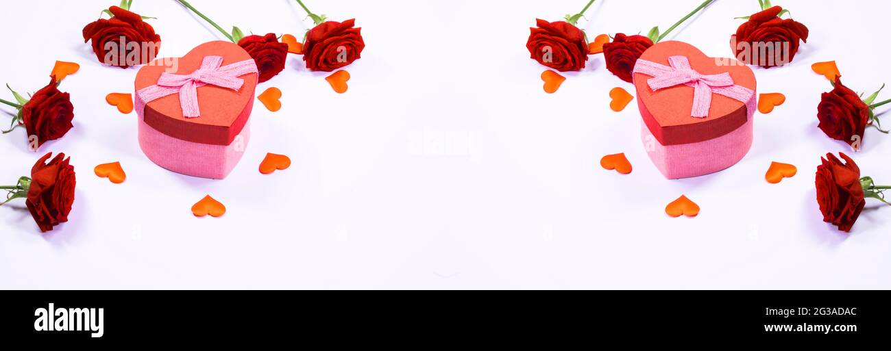 Valentines day frame of hearts, red rose flowers and gift box isolated ...