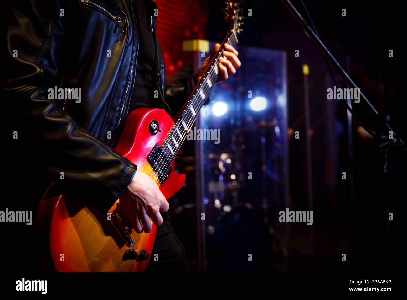 Guitar during a concert. Guitarist on stage Stock Photo - Alamy