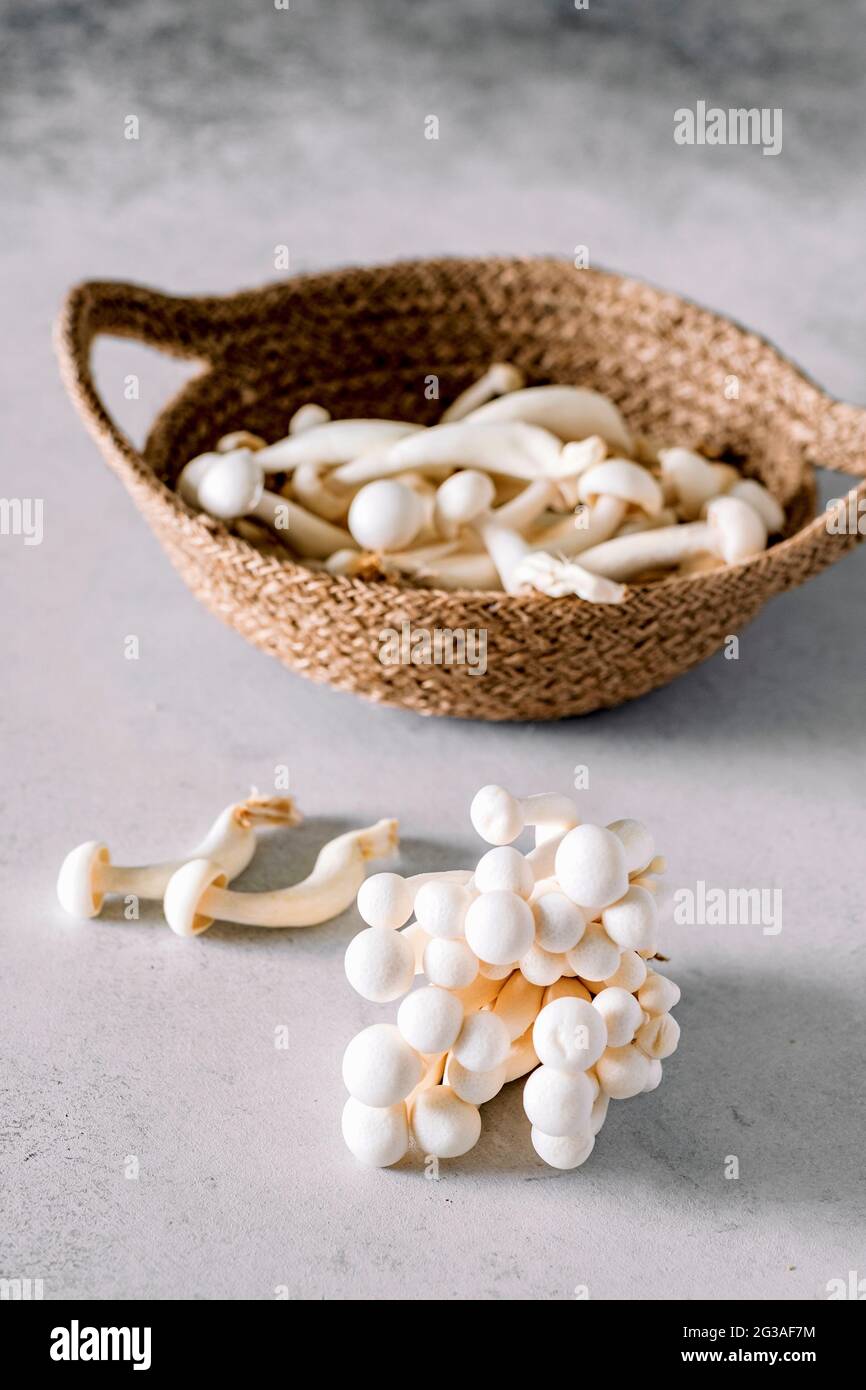 White Asian Enoki mushroom, raw vegan food, fungus, close-up Stock ...