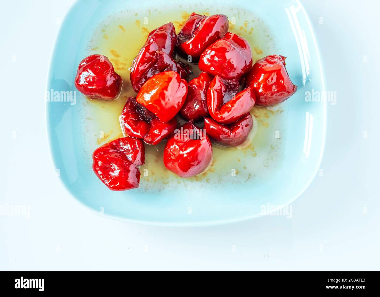 Plate of Roast Red Peppers, Pimentos, in Olive Oil Stock Photo - Alamy