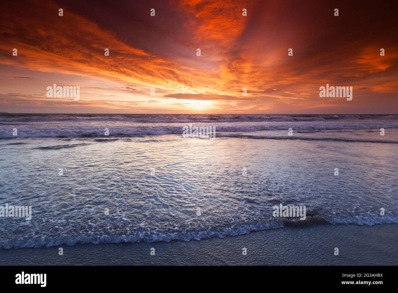 Radiant sunset from Bali Double Six beach surf waves and colorful ...
