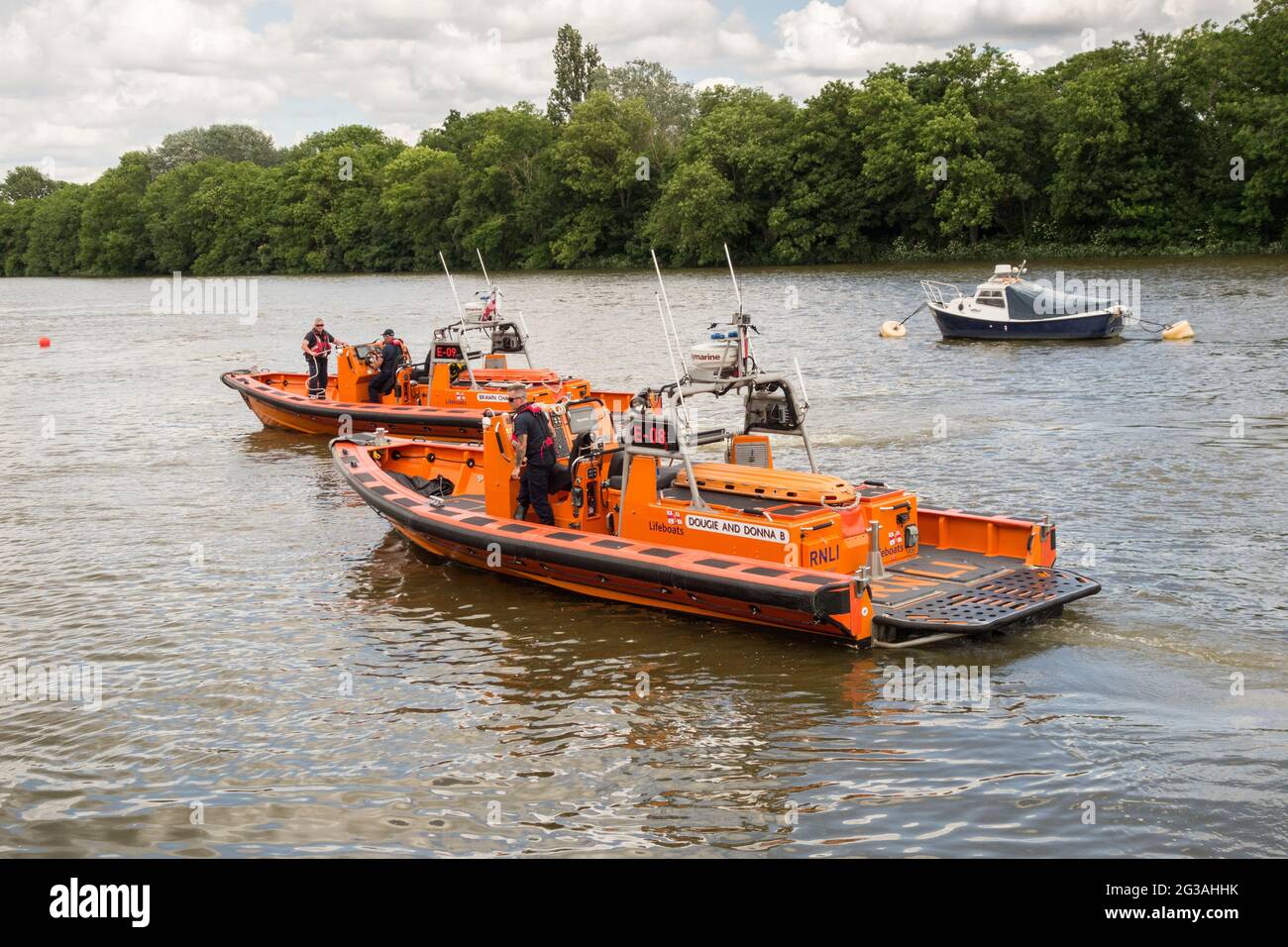 RNLI crew and inflatables on the River Thames at Chiswick Lifeboat ...