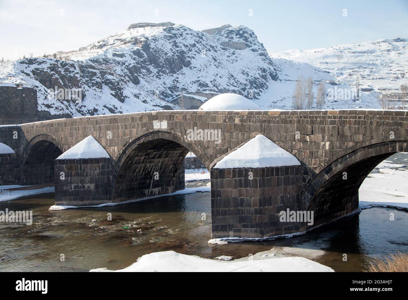 Kars, Turkey - 01/22/2016: This historical stone bridge built by the ...