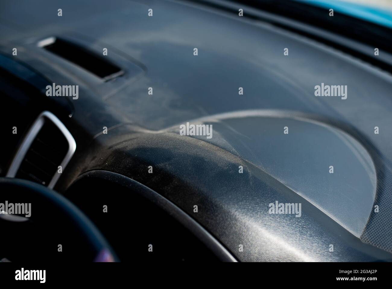 Thick layer of dust on the plastic car dashboard Stock Photo - Alamy