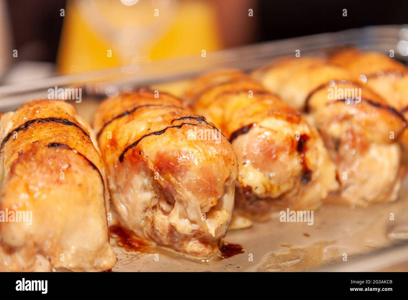 Row of baked meat rolls Stock Photo - Alamy