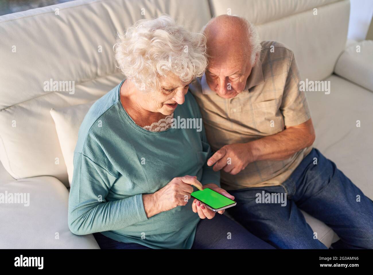 Woman uses smartphone writes message hi-res stock photography and ...