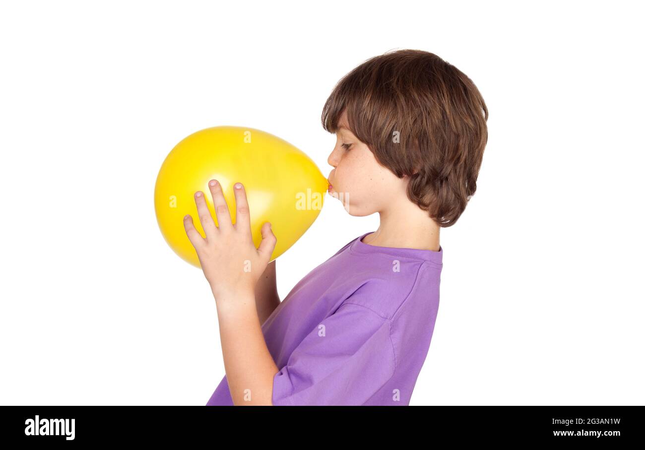 Child blowing up balloon hi-res stock photography and images - Alamy