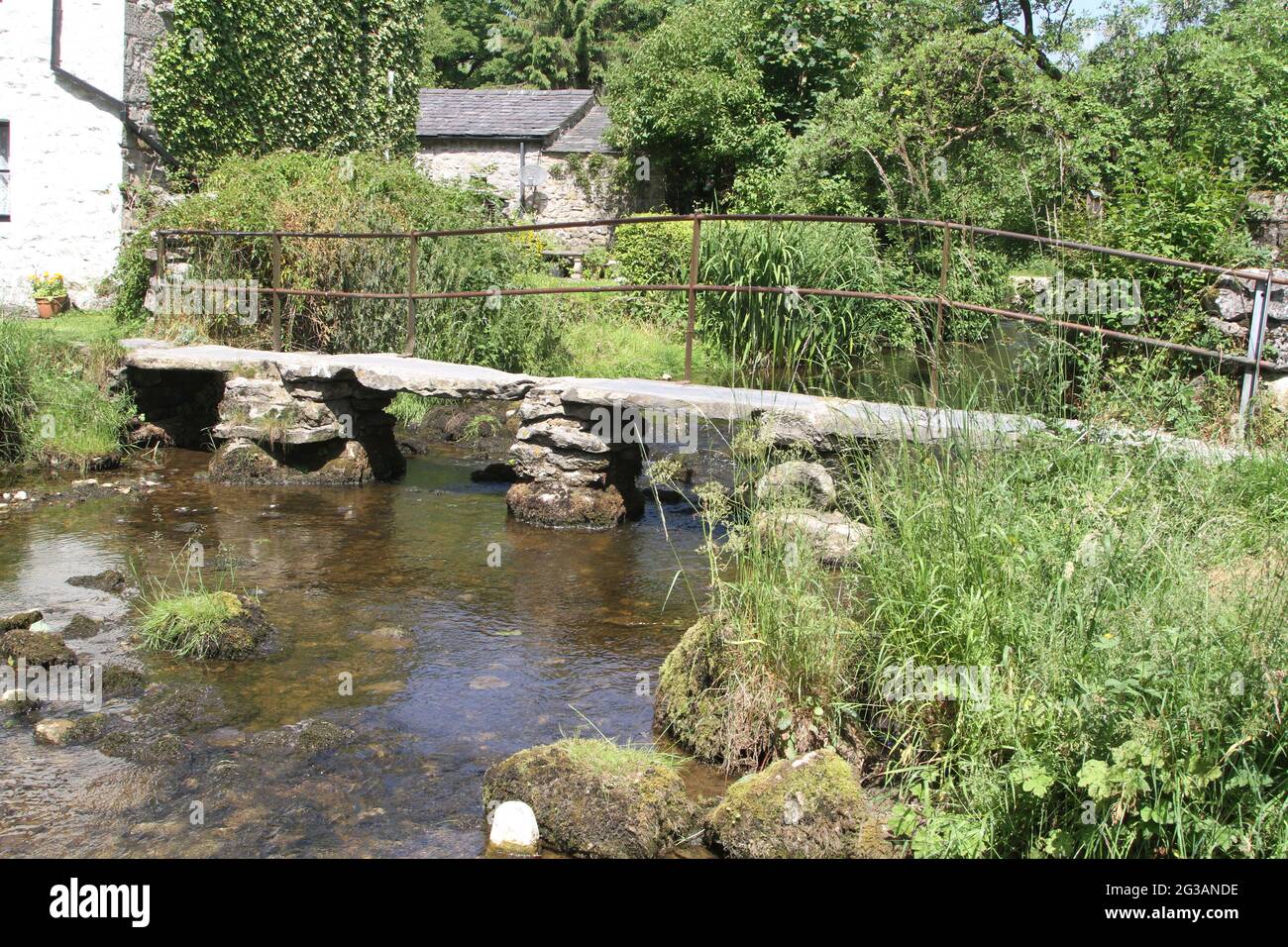 Ancient river crossing a clapper bridge, Malham, Yorkshire, England UK ...