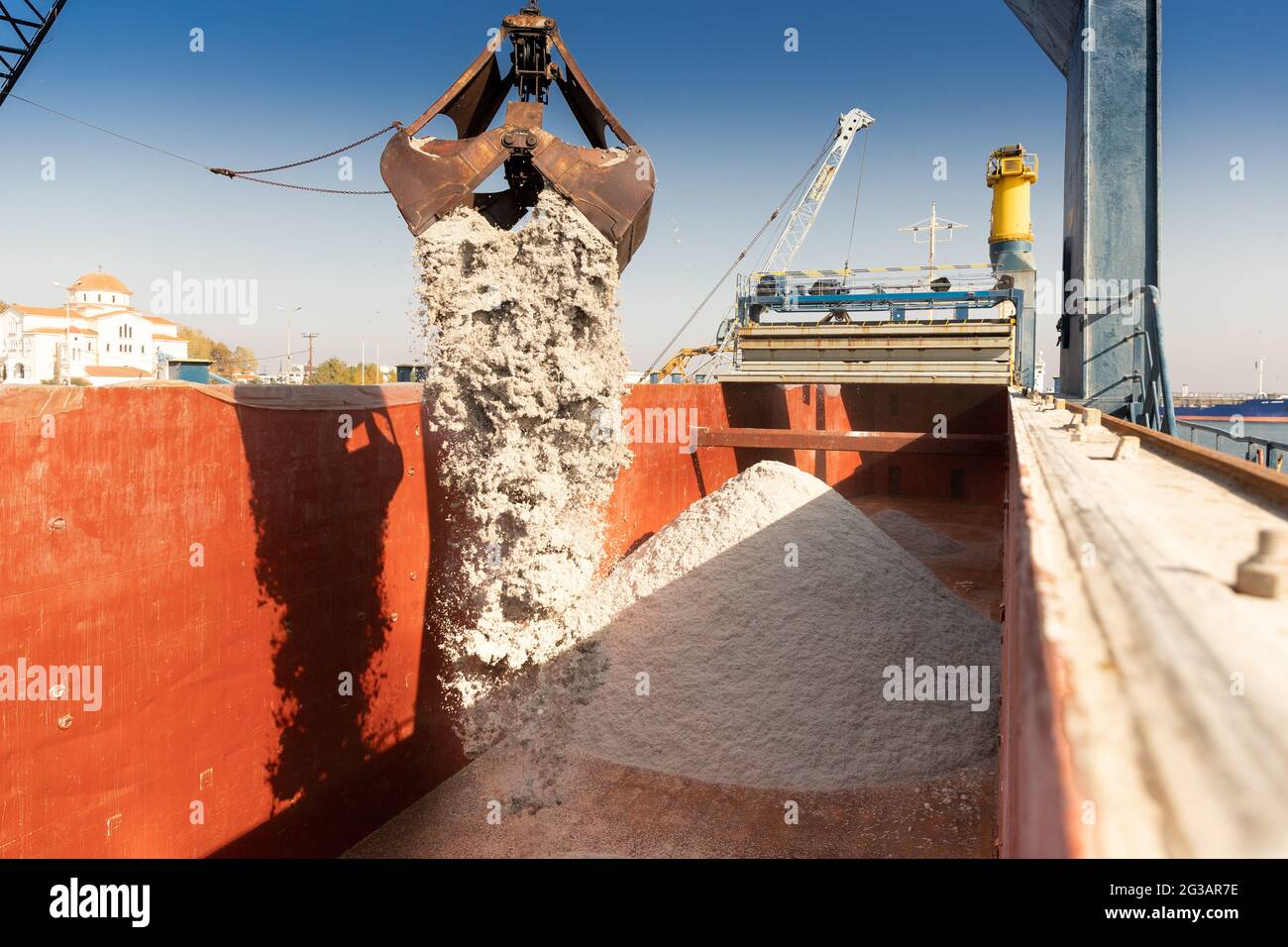 Cotton seed getting loaded to cargo ship with crane and bucket Stock ...