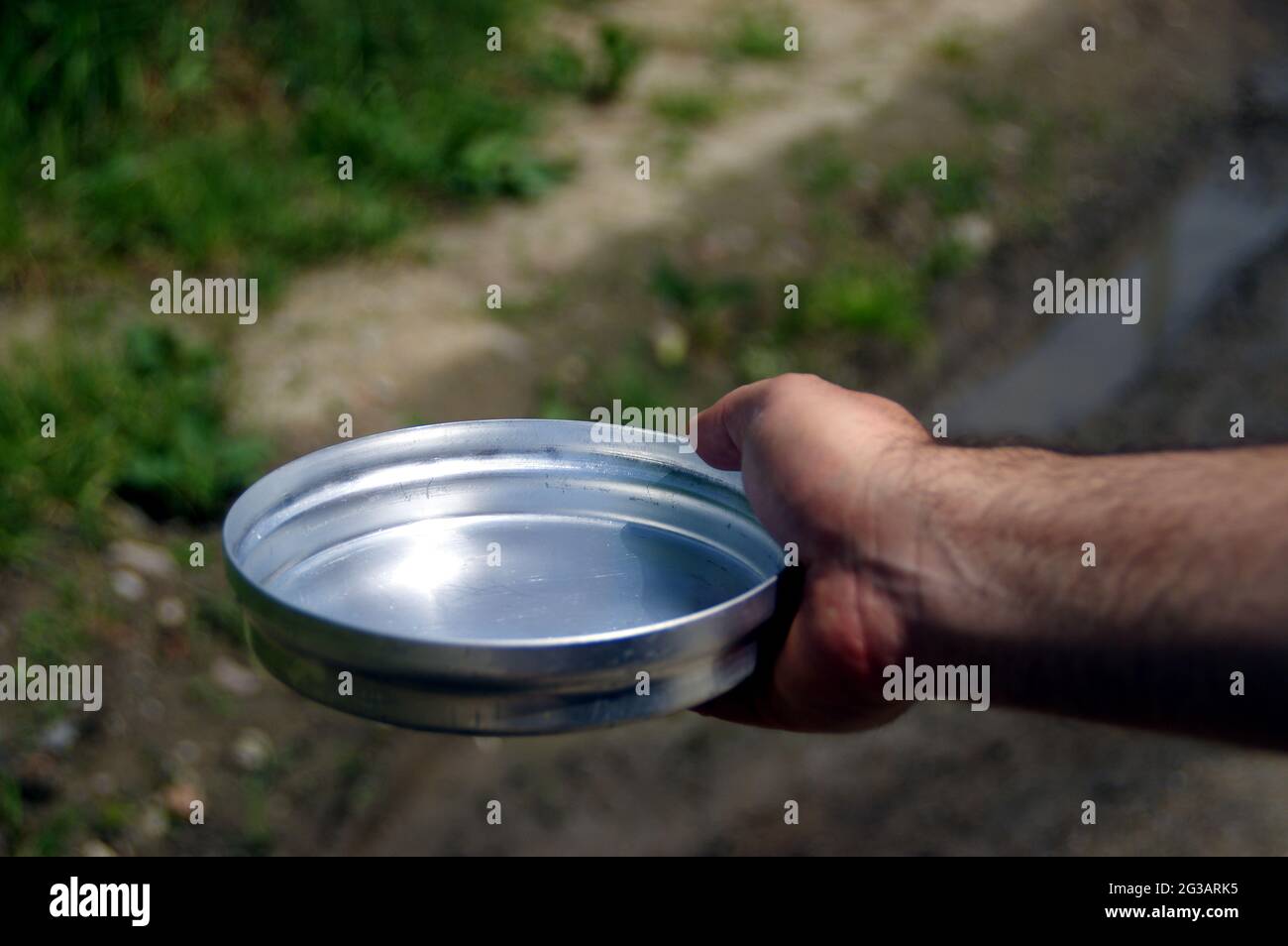 Empty bowl in hand. The concept of global famine and hunger crisis ...