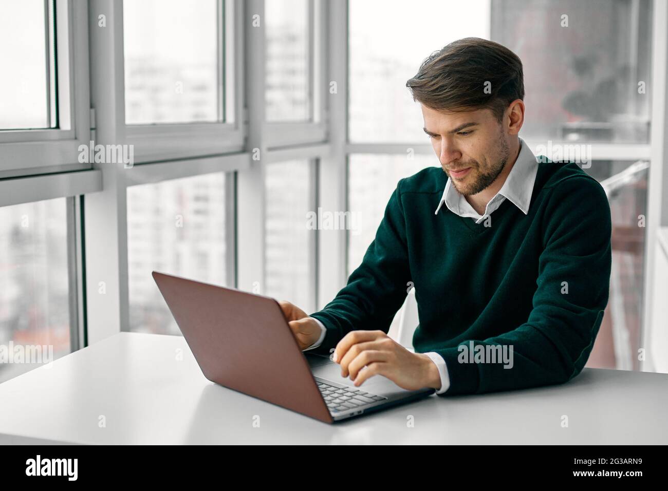 business man typing text on laptop indoors office interior model Stock ...
