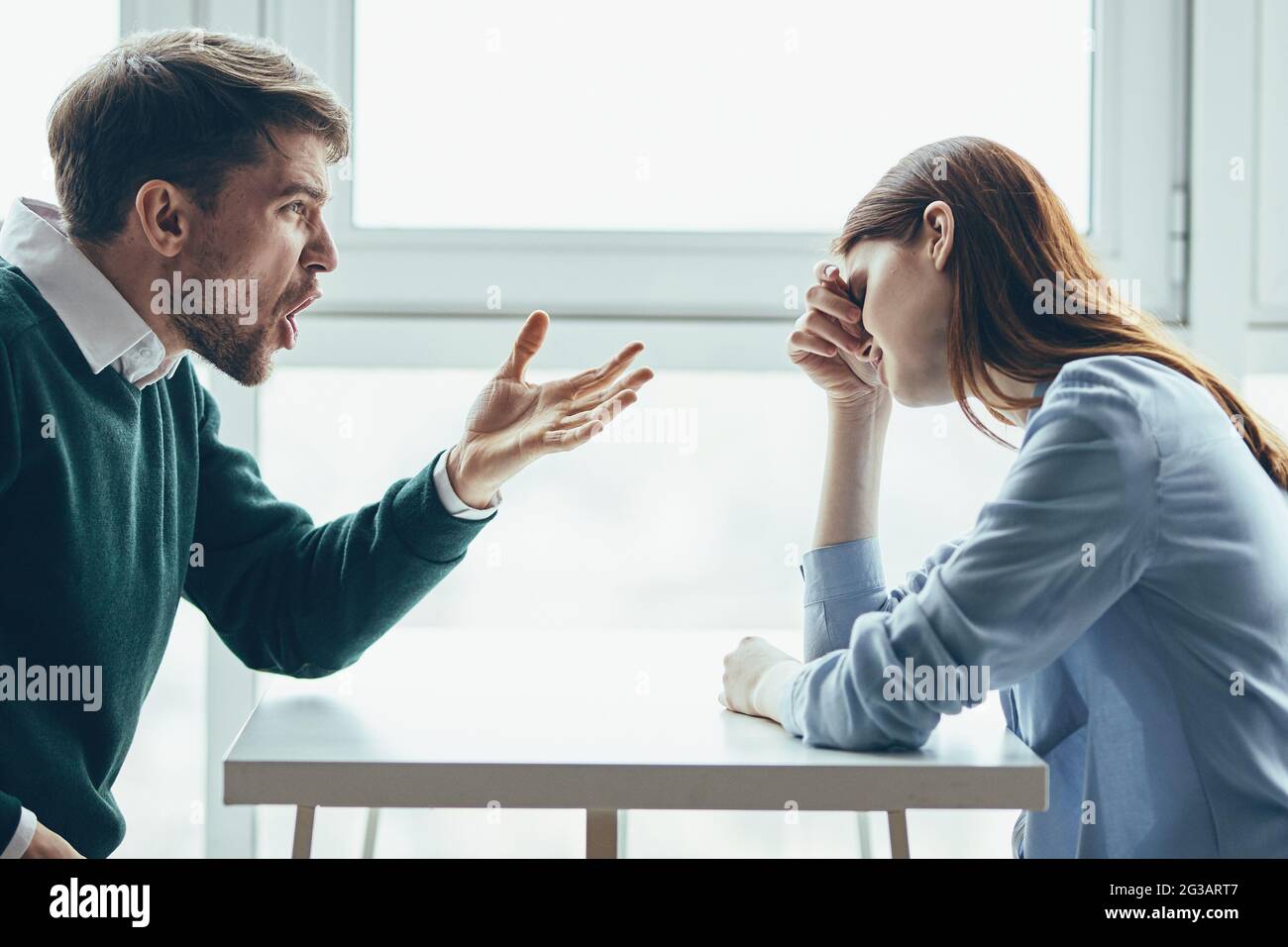 young couple in a cafe emotions dispute conflict quarrel Stock Photo ...