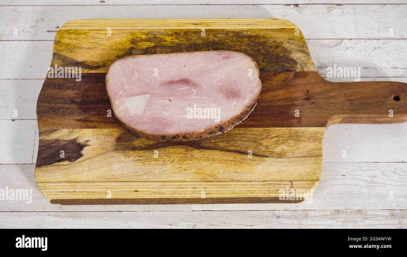Cutting organic honey ham on hi-res stock photography and images - Alamy