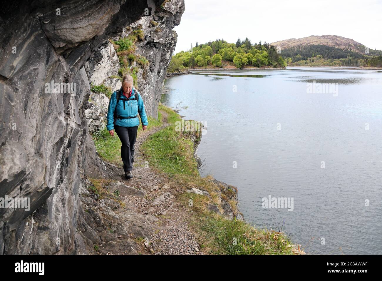 Walker on the Silver Walk alongside Loch Moidart, Ardnamurchan ...