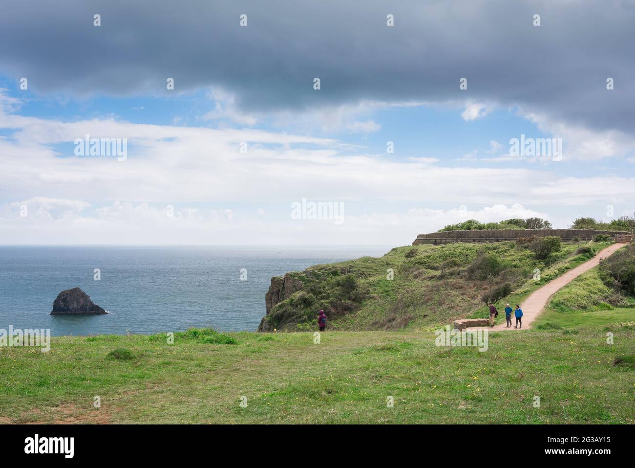 Devon coast path, view of people walking the South West Coast Path at ...