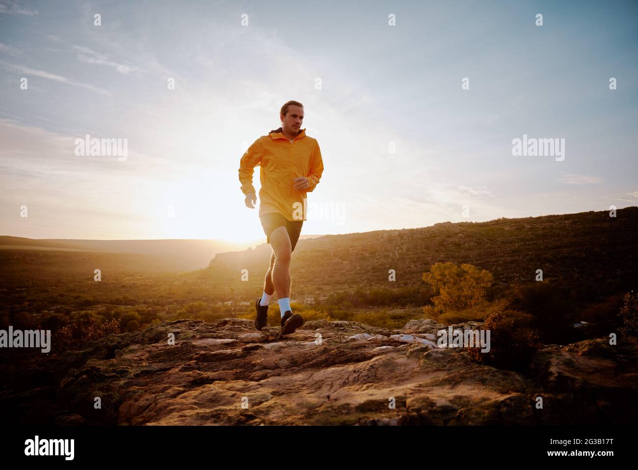 Man running mountain path hi-res stock photography and images - Alamy