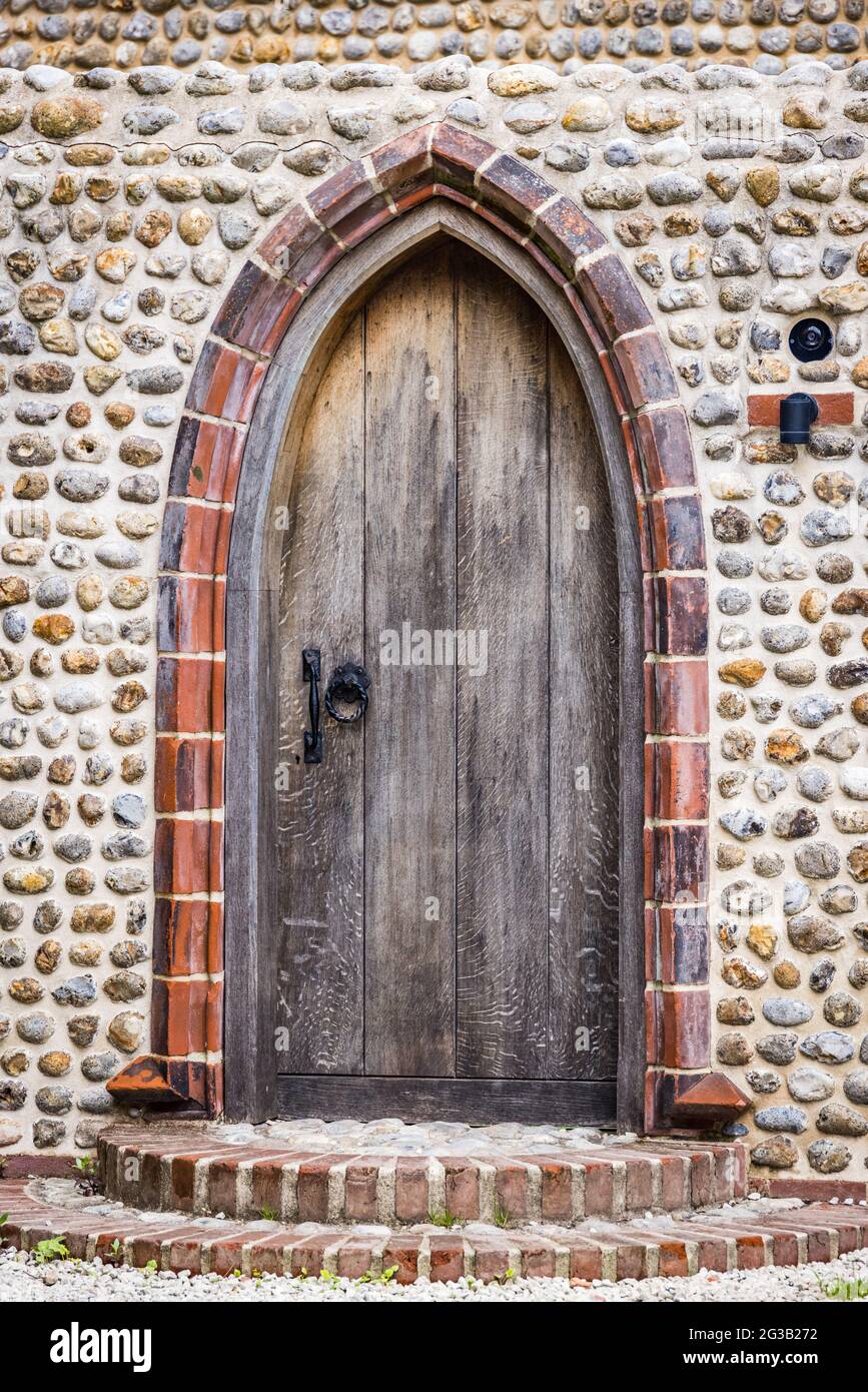 Old wooden arched doorway Stock Photo - Alamy