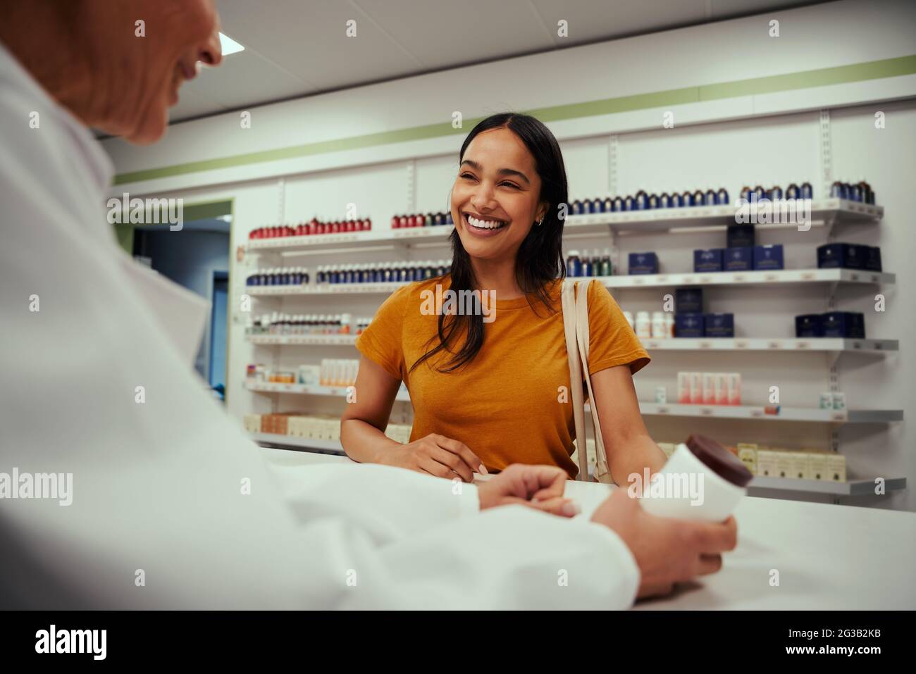 Customer standing at counter hi-res stock photography and images - Alamy