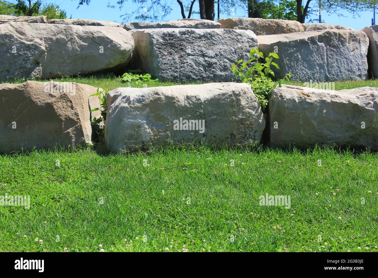 Huge boulders in the park during summertime Stock Photo - Alamy