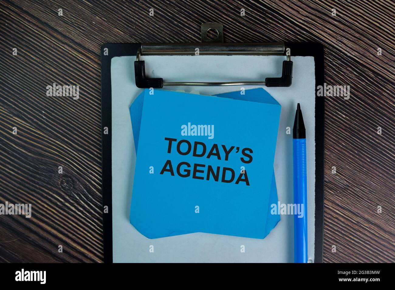 Today's Agenda write on sticky notes isolated on Wooden Table Stock ...