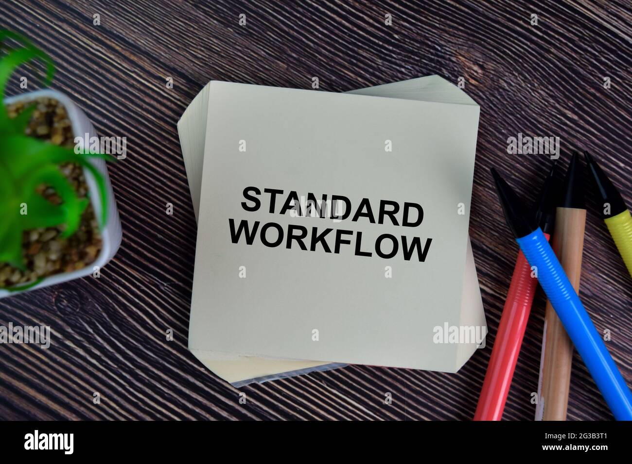 Standard Workflow write on sticky notes isolated on Wooden Table Stock ...