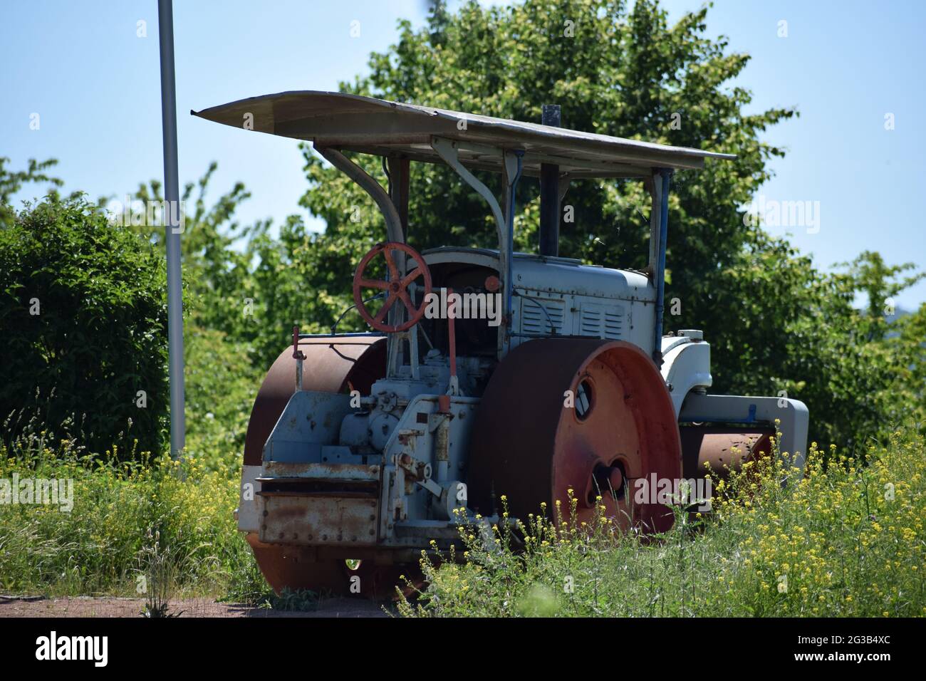 old road building machine Stock Photo - Alamy