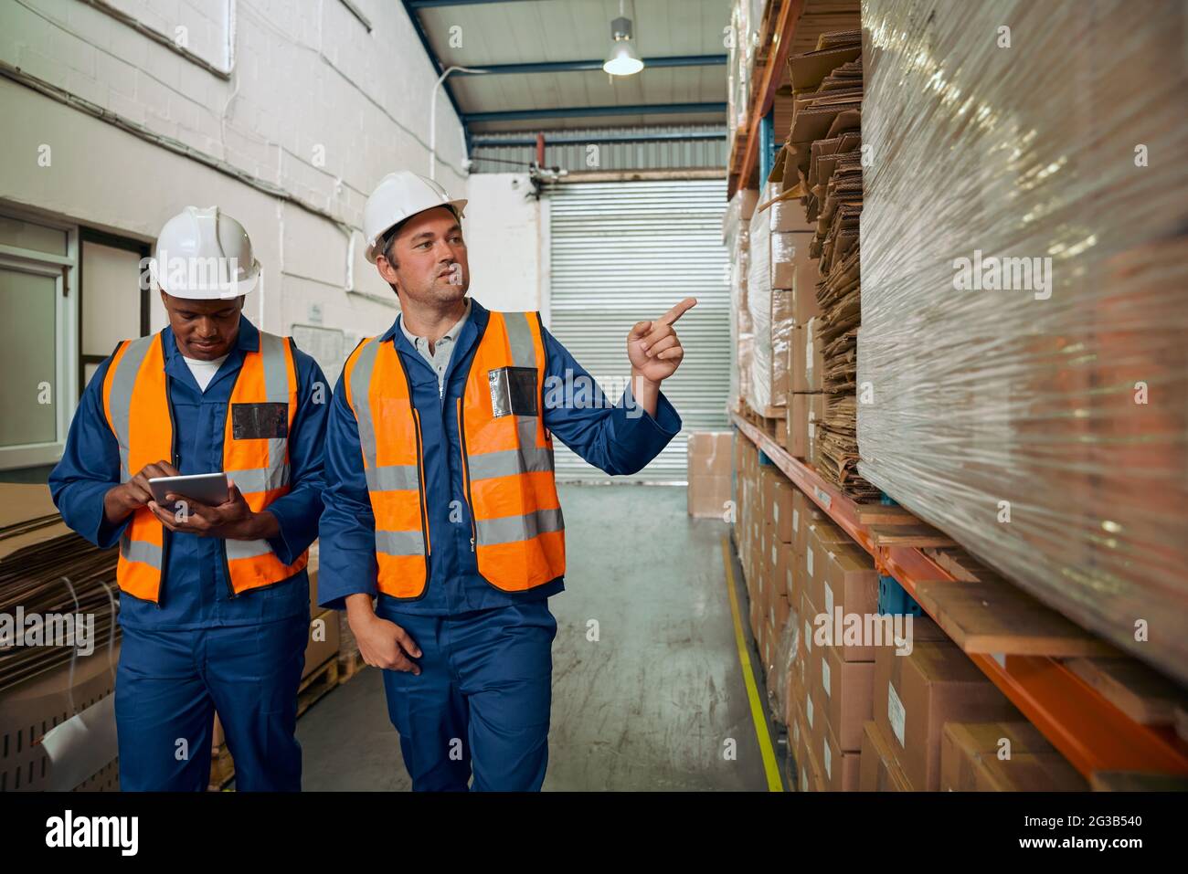 Warehouse professional checks inventory hi-res stock photography and ...