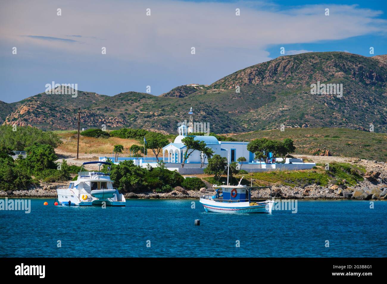 The beach and fishing village of Pollonia in Milos, Greece Stock Photo ...