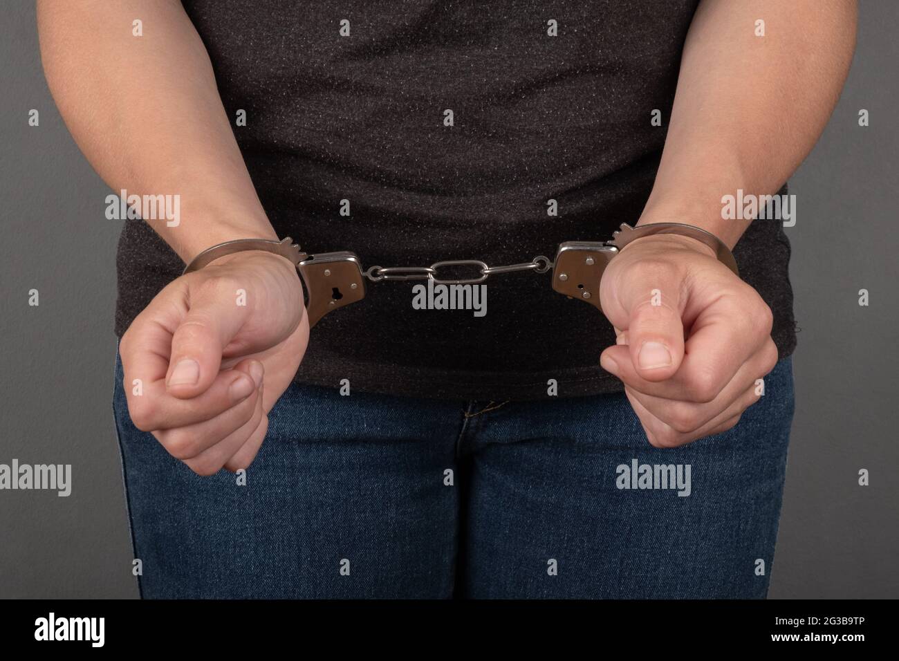 Police girl handcuffed arrest hi-res stock photography and images - Alamy