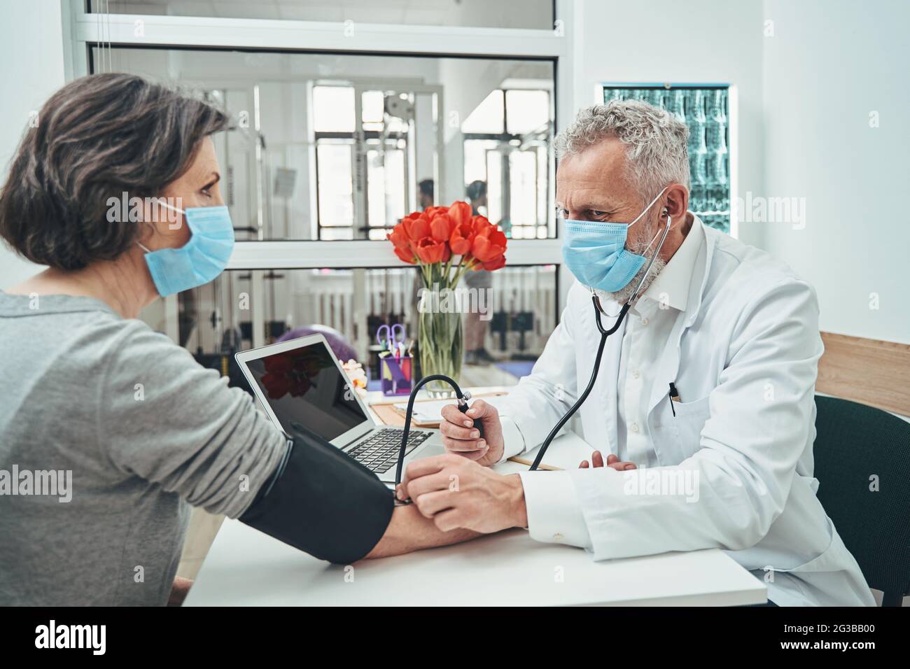 Health wellness doctor measuring hi-res stock photography and images ...