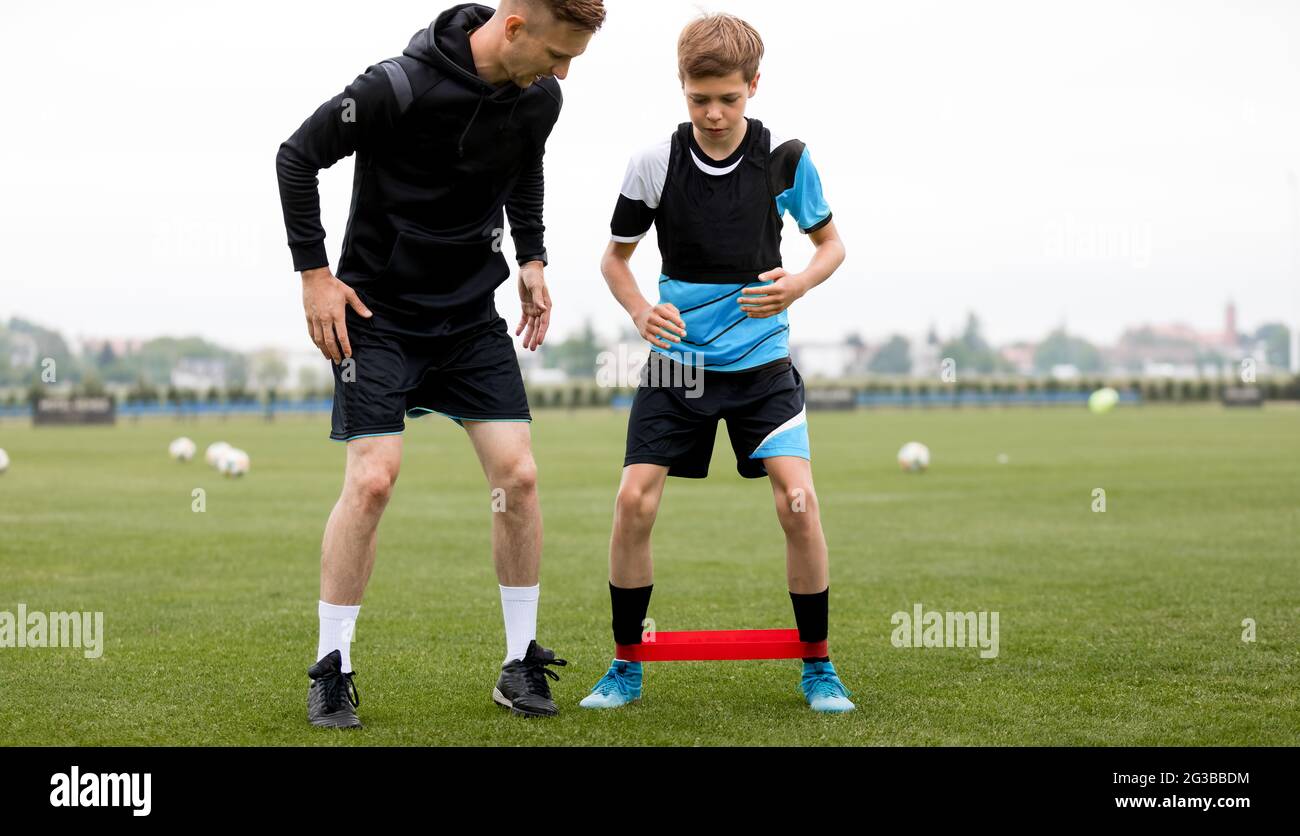 Stretching football hi-res stock photography and images - Alamy