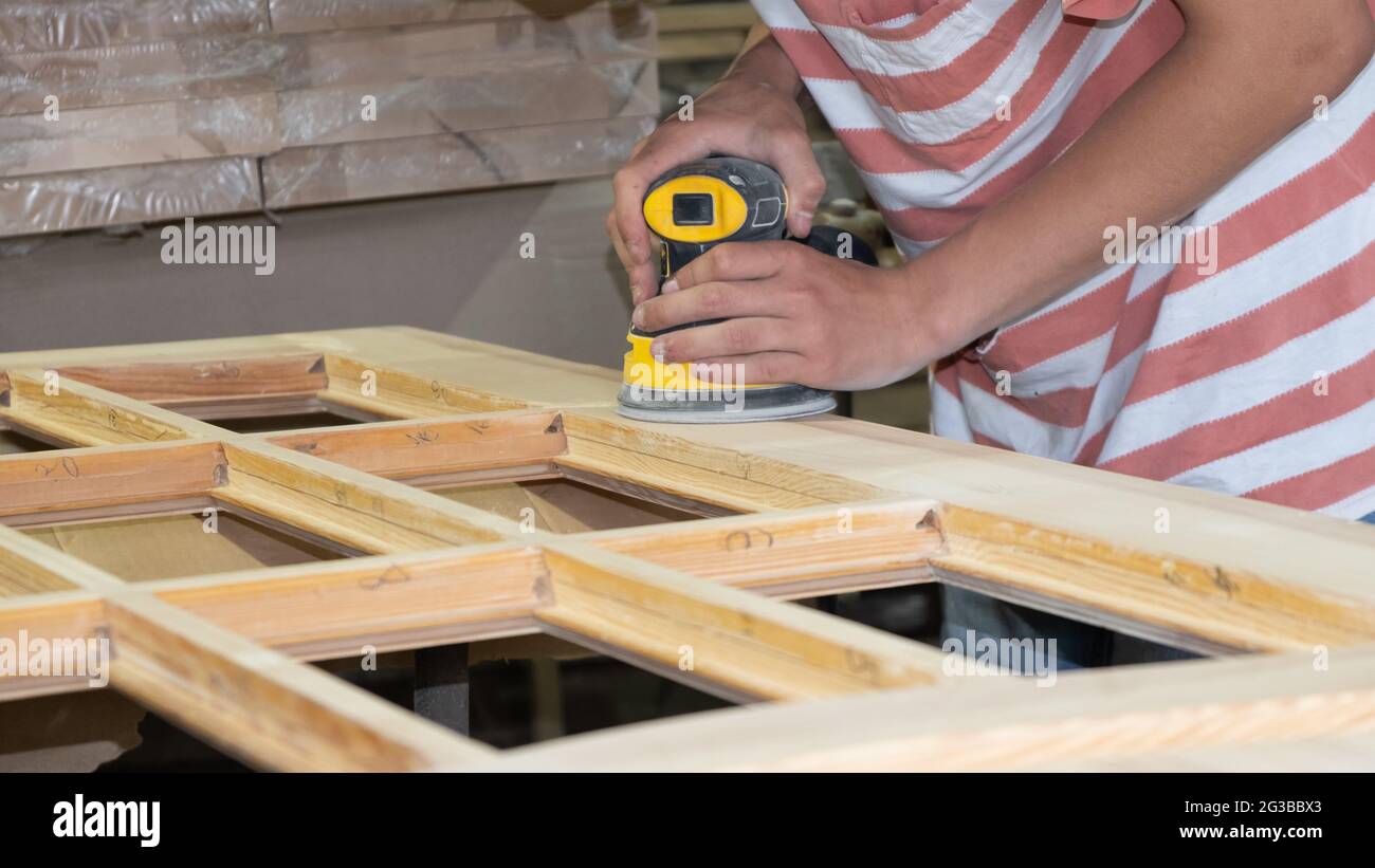 restoration door, polishing with a grinding machine Stock Photo - Alamy