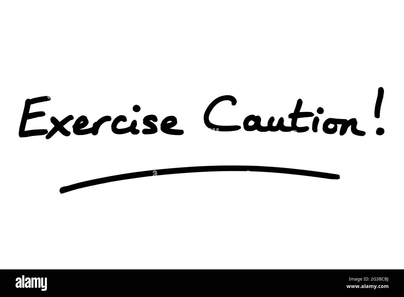 Exercise Caution! handwritten on a white background Stock Photo - Alamy